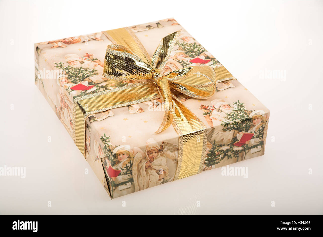 Present cut out in front of white background Stock Photo - Alamy