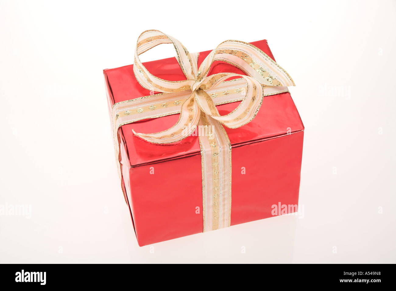 Present cut out in front of white background Stock Photo - Alamy