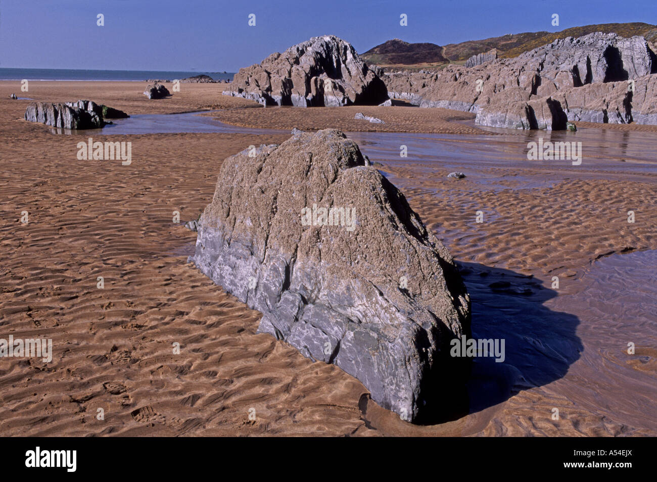 Rocky outcrop on the north sands of Woolacombe beach, North Devon. XPL ...