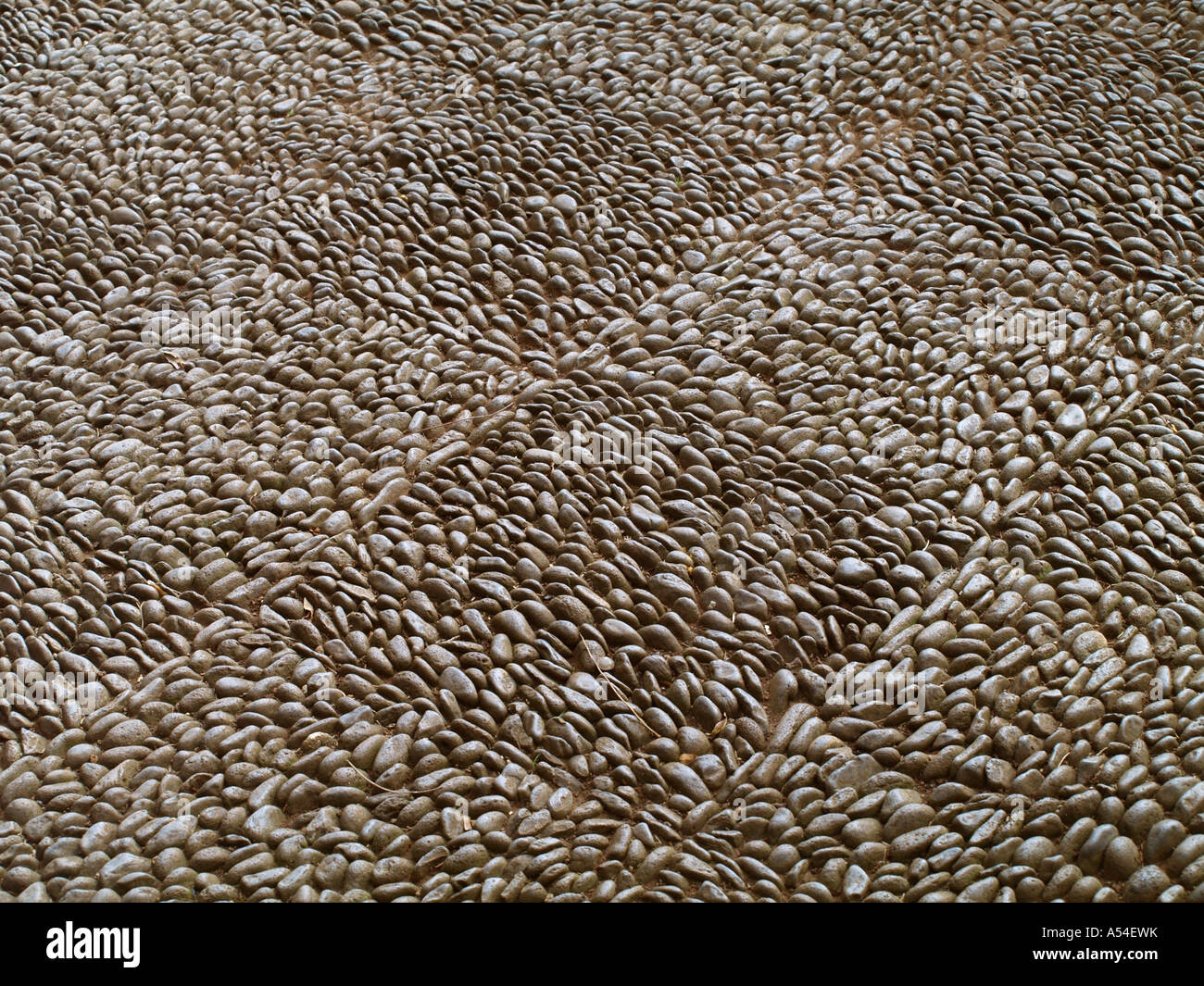 pavement detail made of pebbles Stock Photo - Alamy