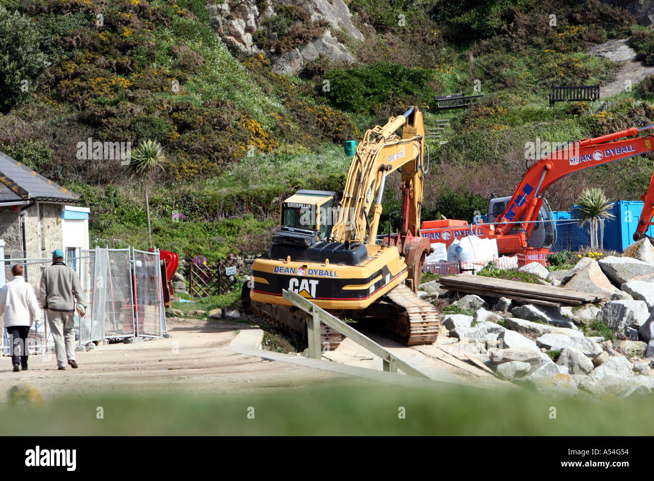 360 Digger on seafront Stock Photo - Alamy