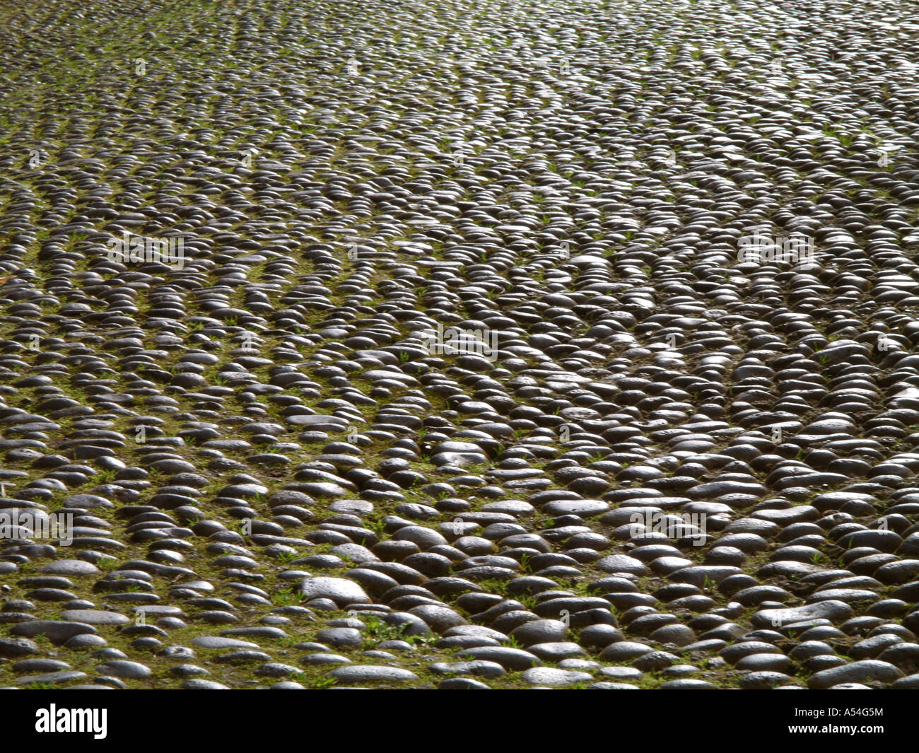pavement detail made of pebbles Stock Photo - Alamy