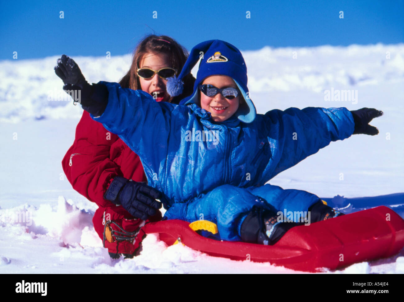 Children playing in snow French Alps Stock Photo - Alamy
