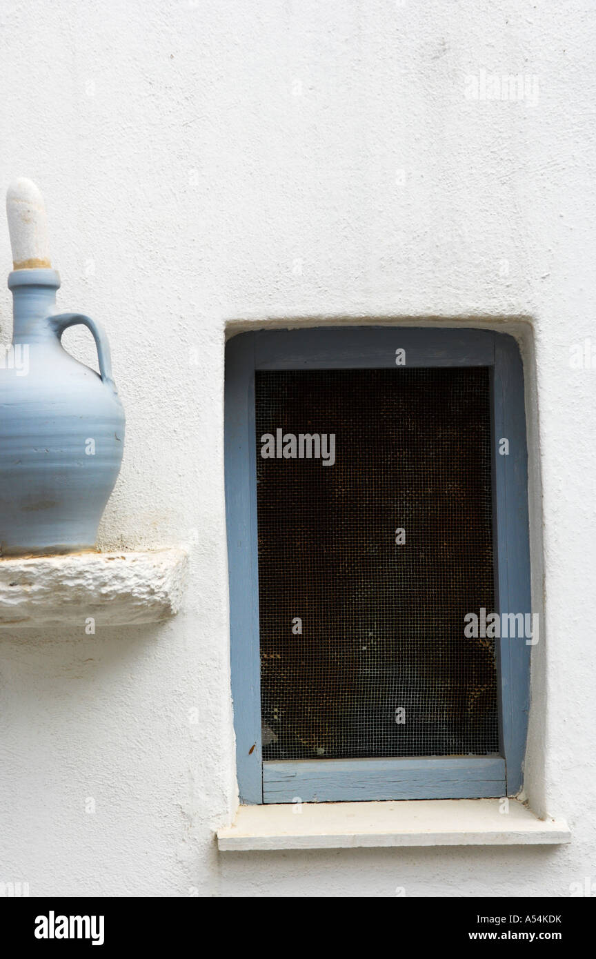 Picturesque traditional window and blue vase Greek island Stock Photo ...