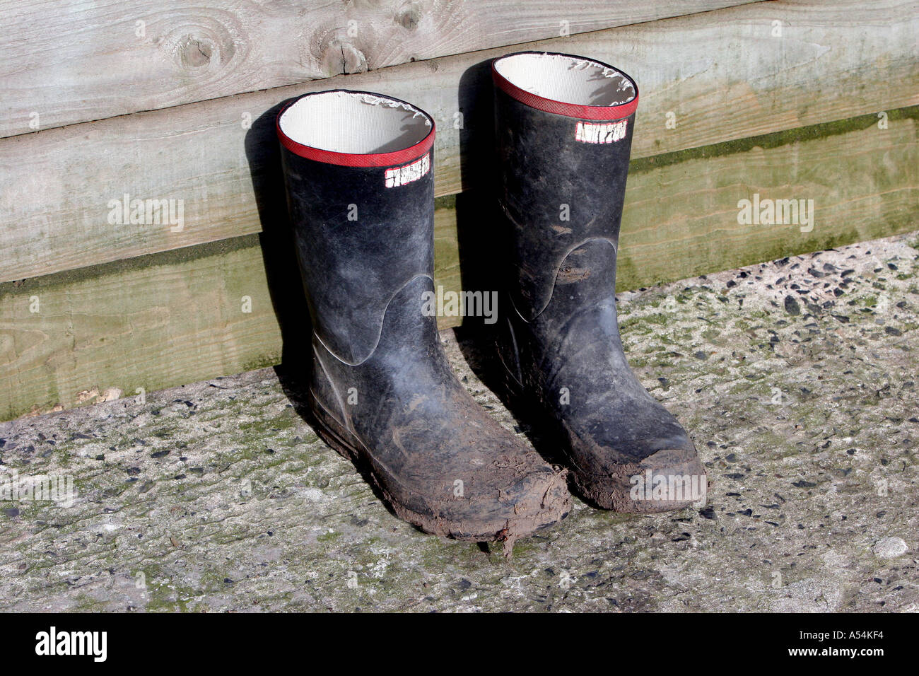 Muddy wellies home hi-res stock photography and images - Alamy