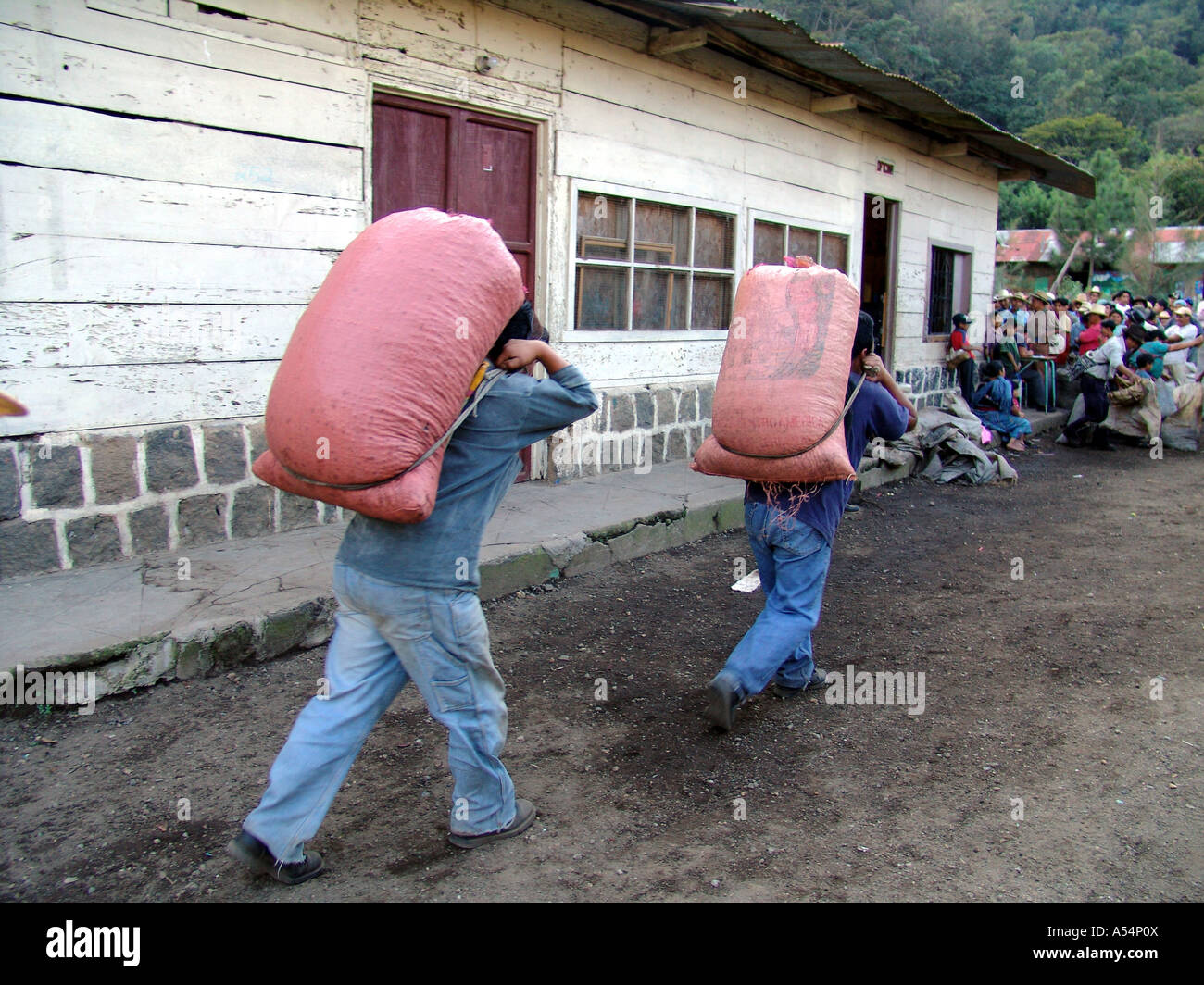 Men carrying sacks hi-res stock photography and images - Alamy