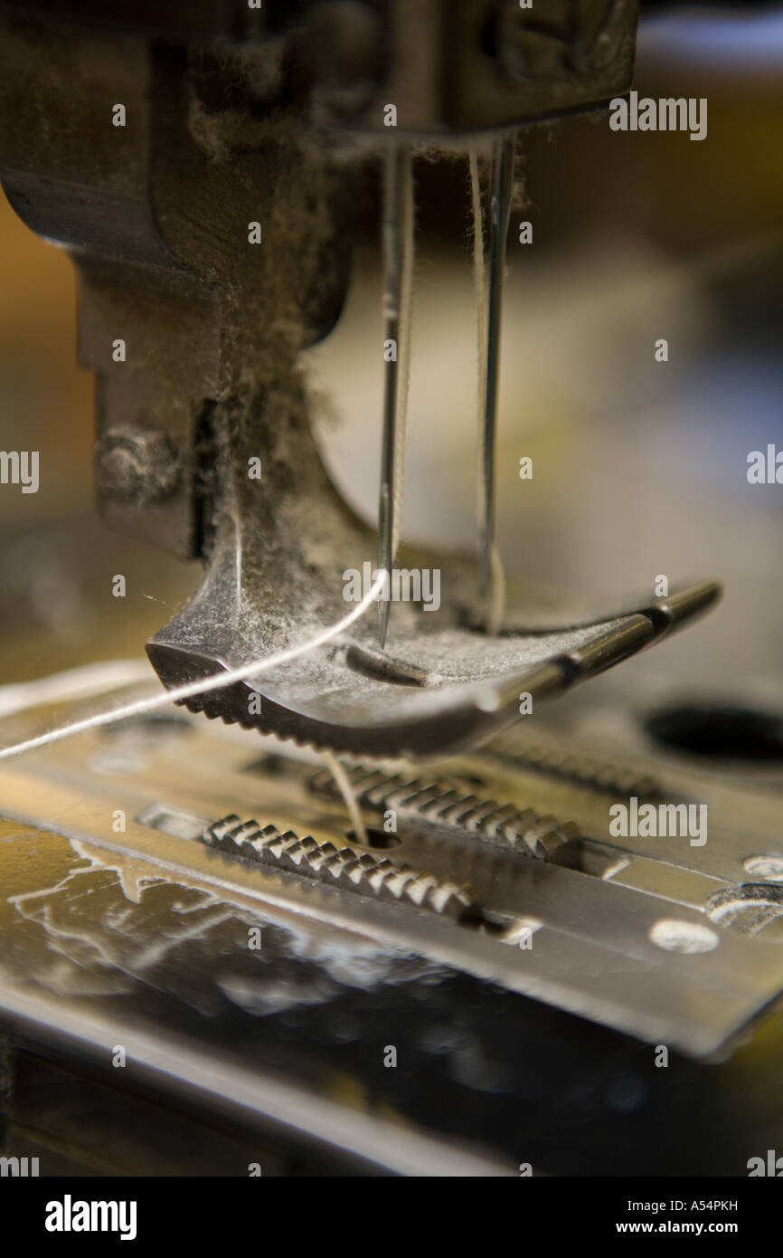 close up shot of the needle and foot of a old sewing machine Stock ...