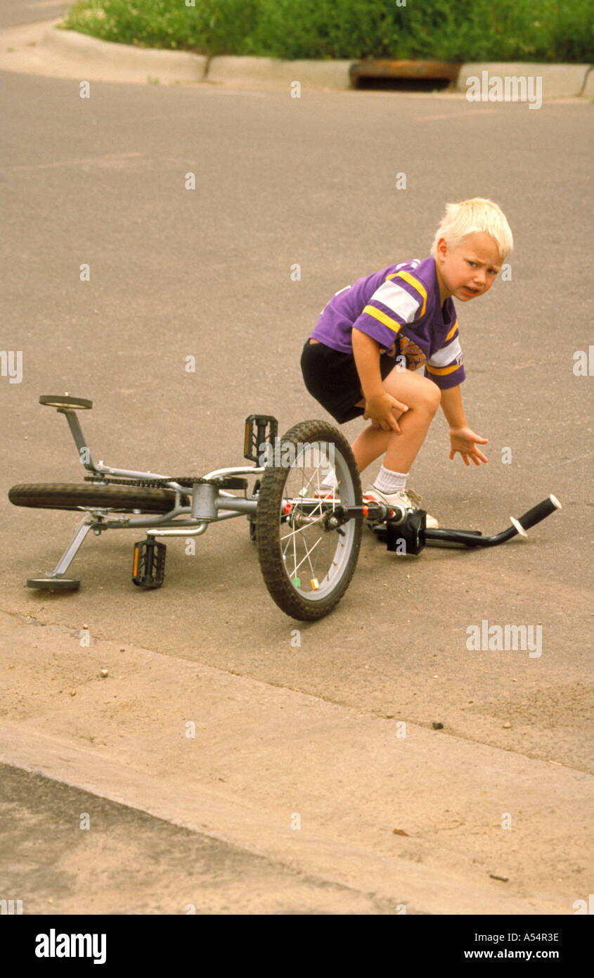 Boy falling off his bike St Paul Minnesota Stock Photo - Alamy