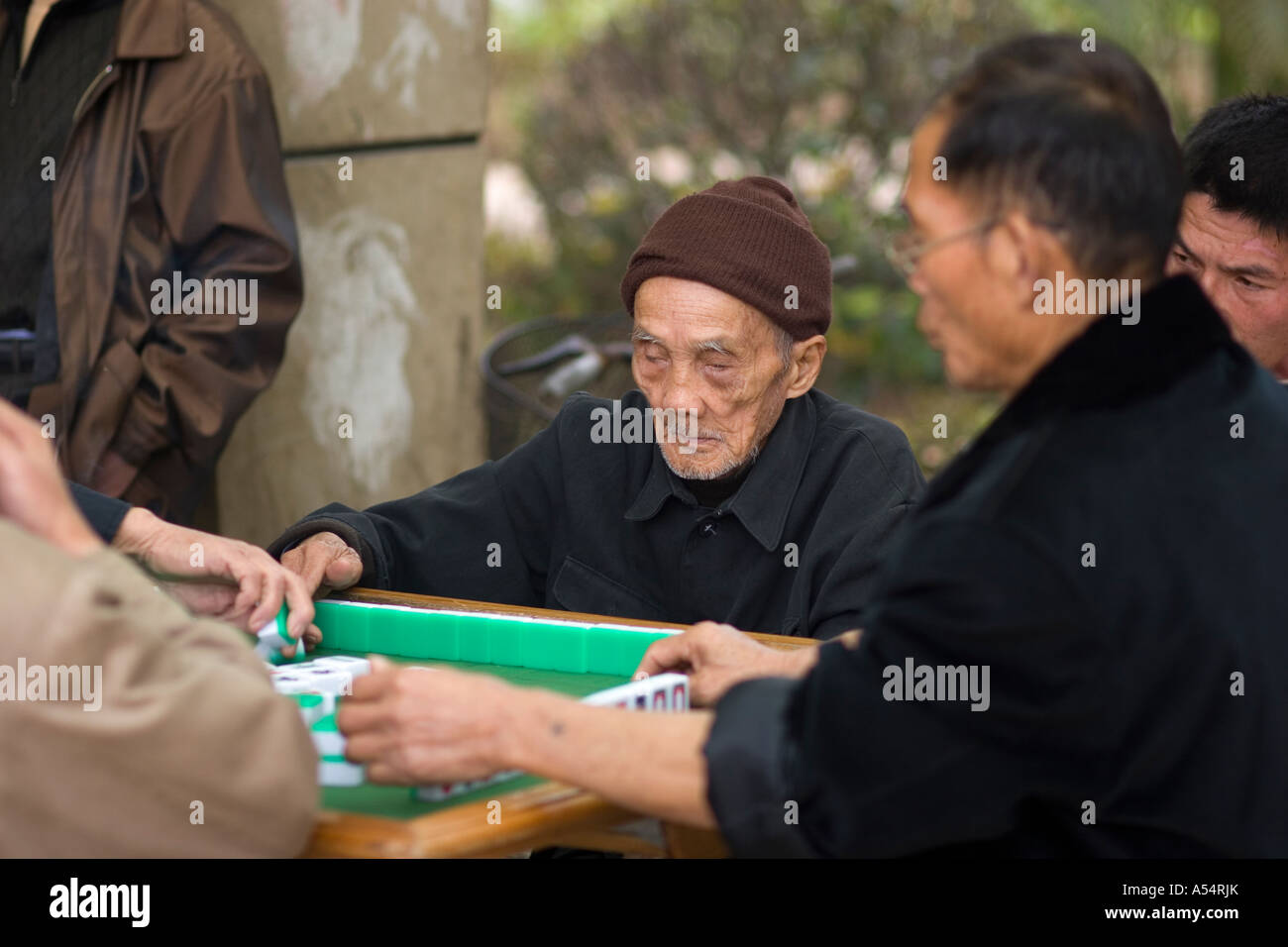 Old men playing games in the park Nanning China Stock Photo - Alamy