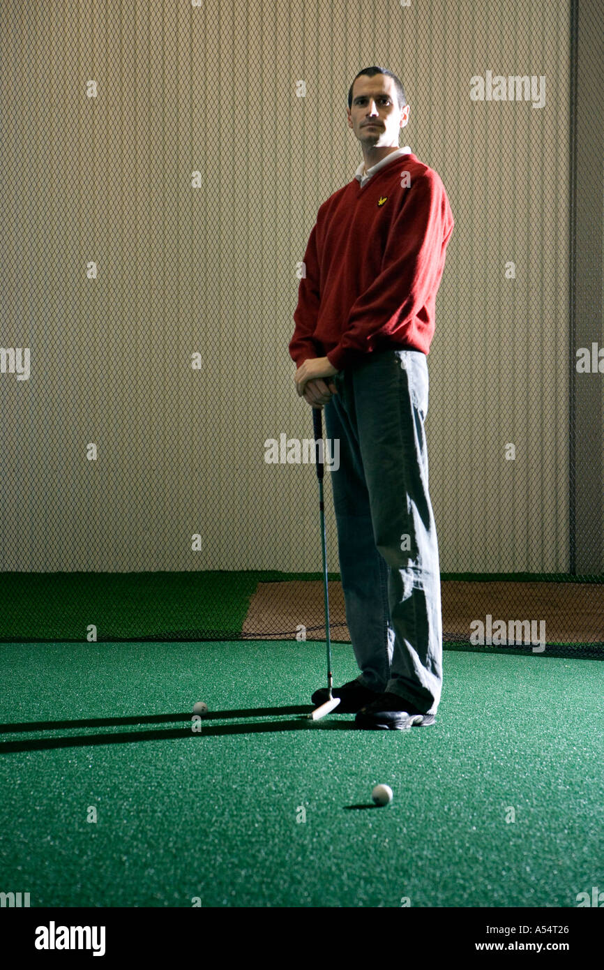 Golfer standing proud Stock Photo - Alamy