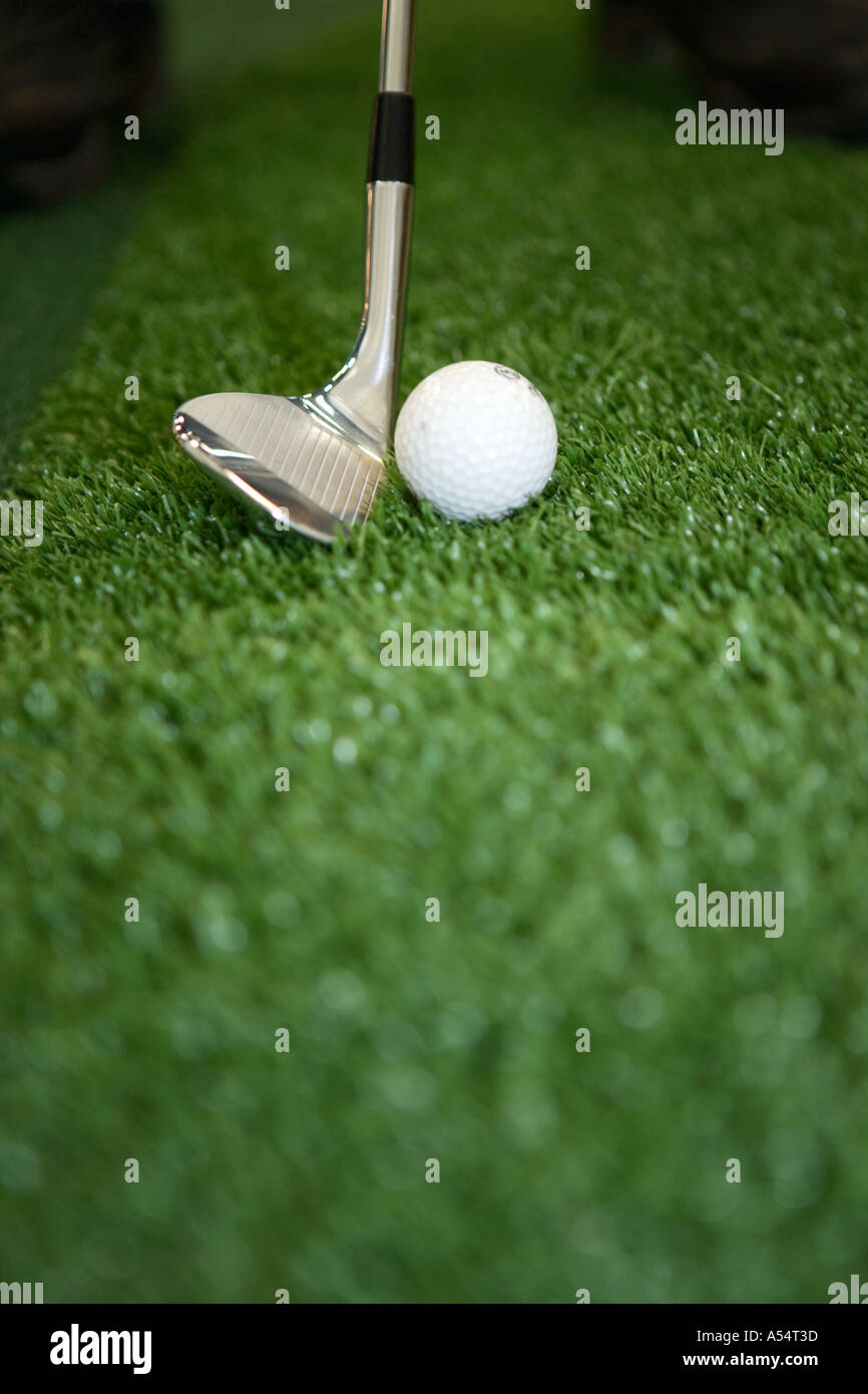 Golf ball club Stock Photo - Alamy