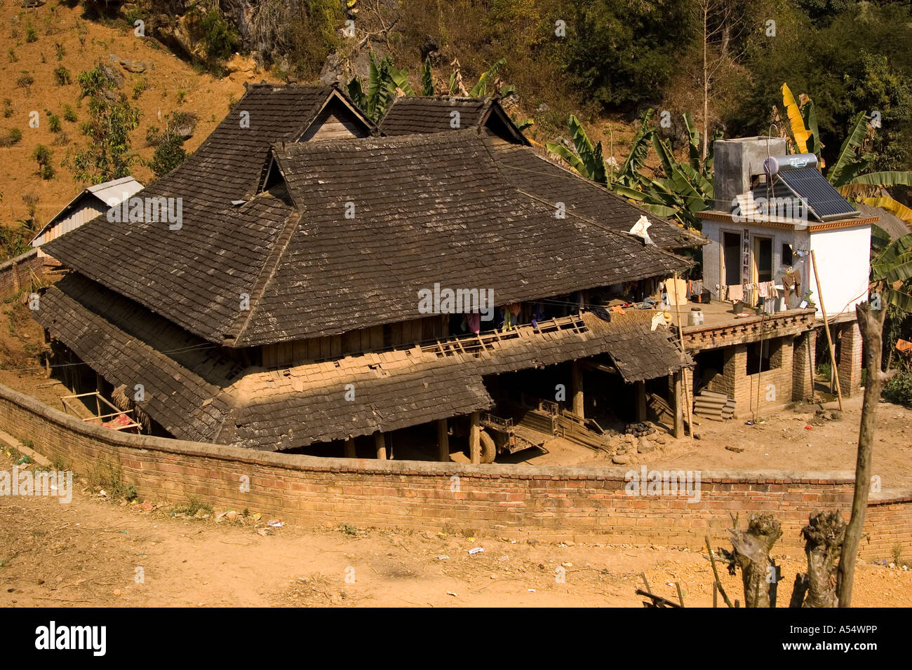 Dai home in a village south of Jinghong China Stock Photo - Alamy