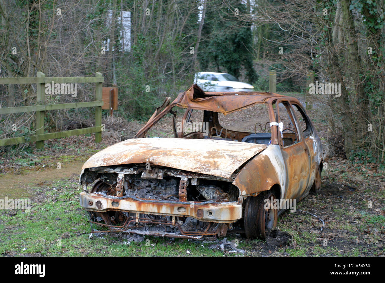 Wrecked and burnt out shell of car Stock Photo - Alamy