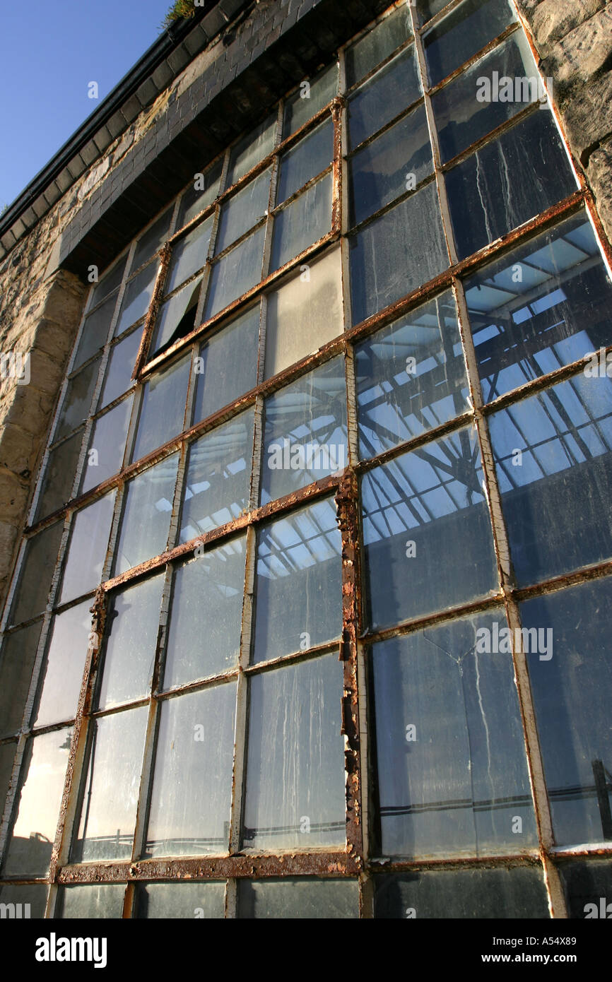Rusty windows of engine sheds in the GWR railworks Swindon Stock Photo ...