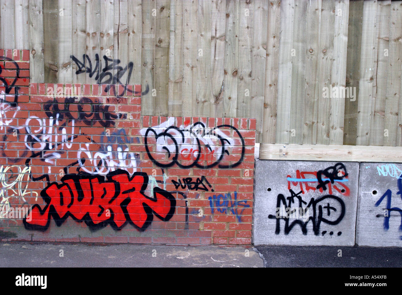 Random graffiti and tags on brick wall in Swindon Wiltshire Stock Photo ...