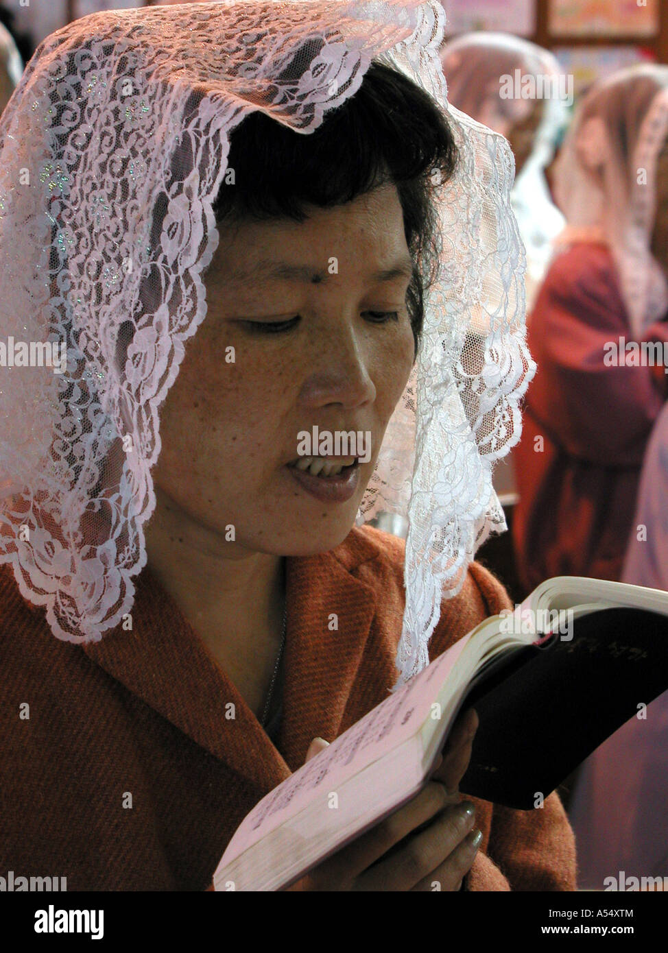 Painet ip2162 woman head scarf shawl korea catholic mass seoul 2003 ...