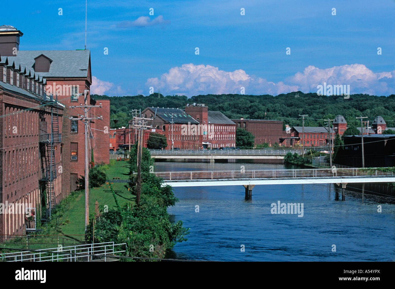 Factories lined up to river s edge Chicopee MA Stock Photo - Alamy