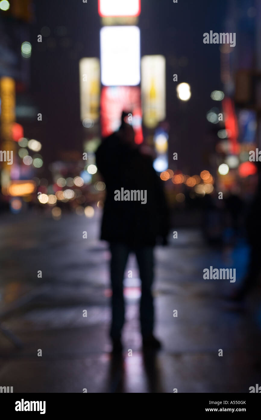 Shooting home video in Times Square during the snow NYC Stock Photo - Alamy
