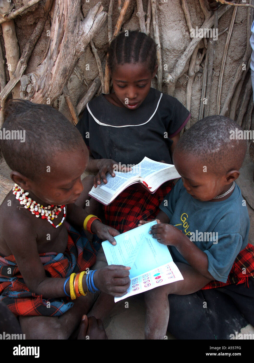 Tribal people reading hi-res stock photography and images - Alamy