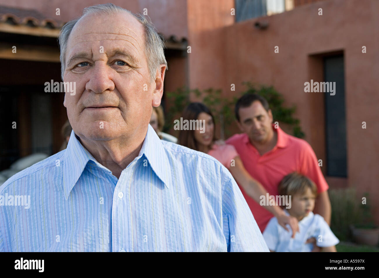 Grandfather with family Stock Photo - Alamy