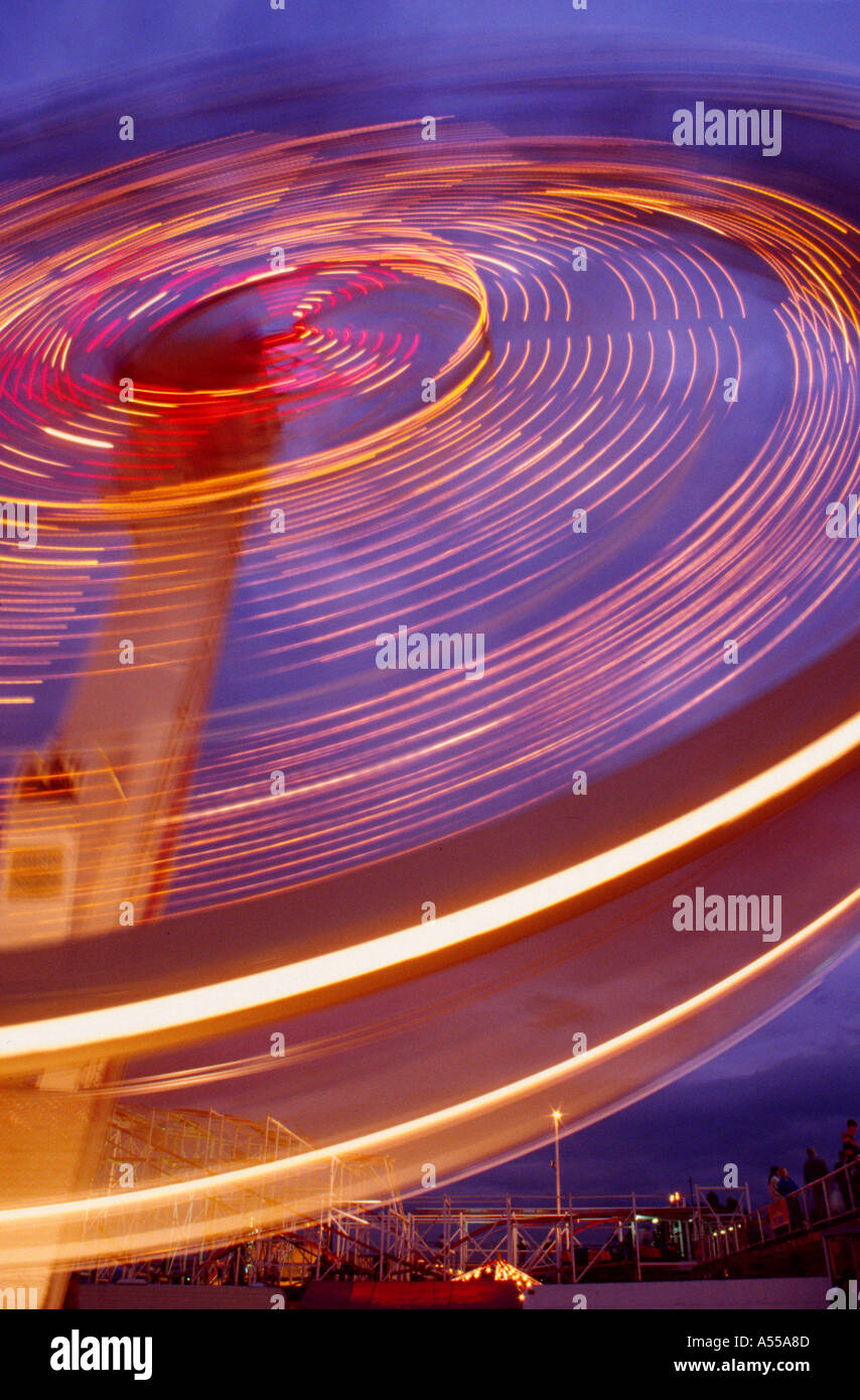 Fairground wheel, Ferris wheel, in motion at dusk Stock Photo - Alamy