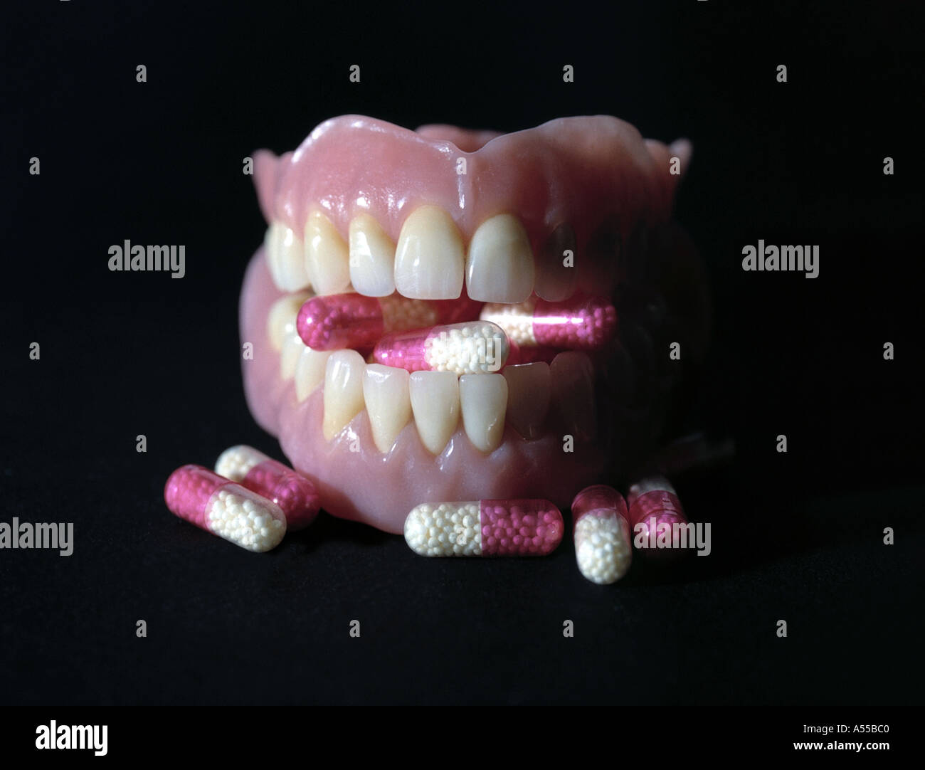 teeth and capsules Stock Photo - Alamy