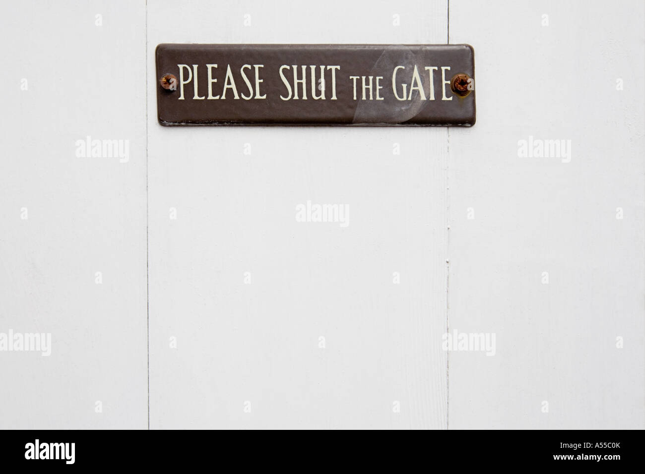 Sign on a gate Stock Photo - Alamy