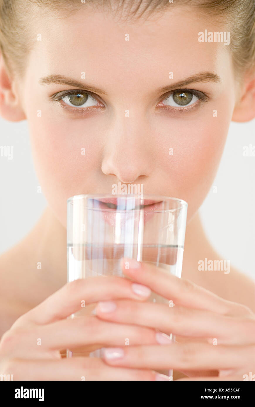 Woman drinking water Stock Photo - Alamy