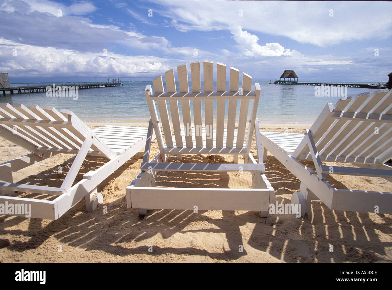 Belize Ambergris Caye chairs on beach Stock Photo - Alamy