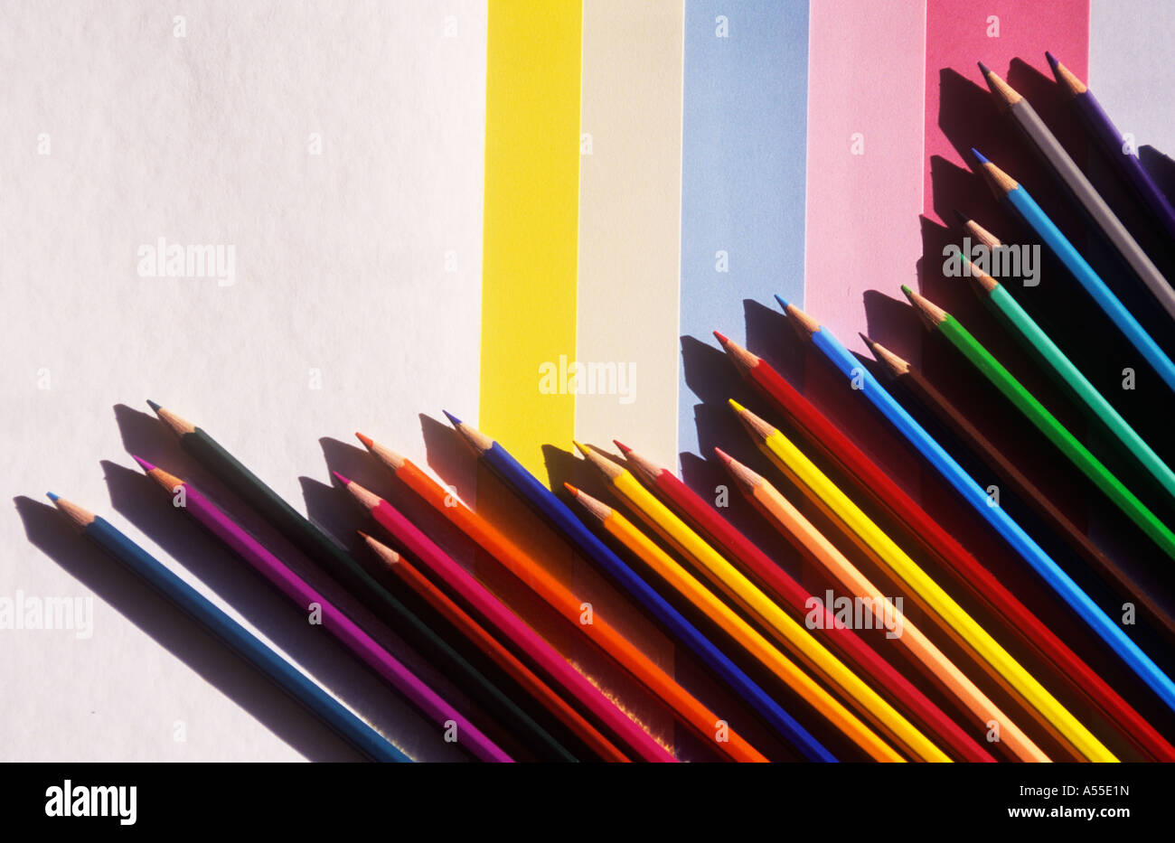 colour pencils on coloured paper Stock Photo - Alamy