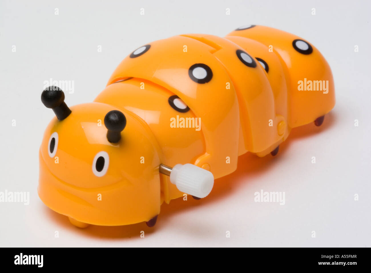 Cheap Chinese plastic toy on white background for cutout cut out yellow ...