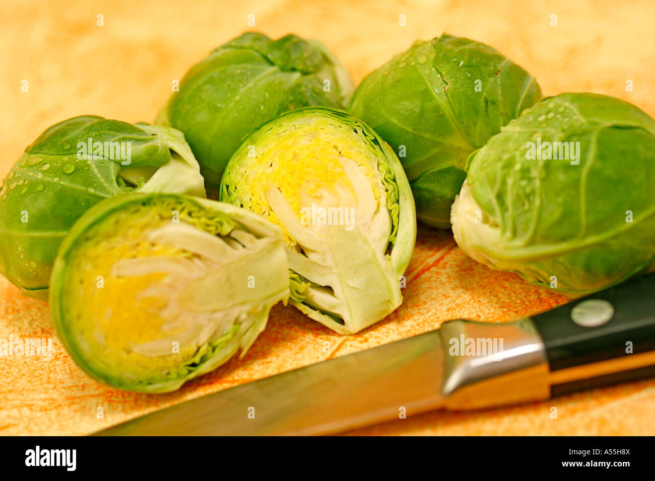 Halves fresh cabbage knife hi-res stock photography and images - Alamy
