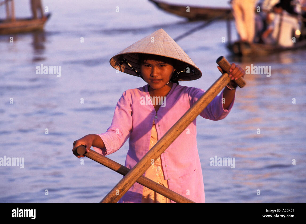 Asian girl rowing on boat hi-res stock photography and images - Alamy