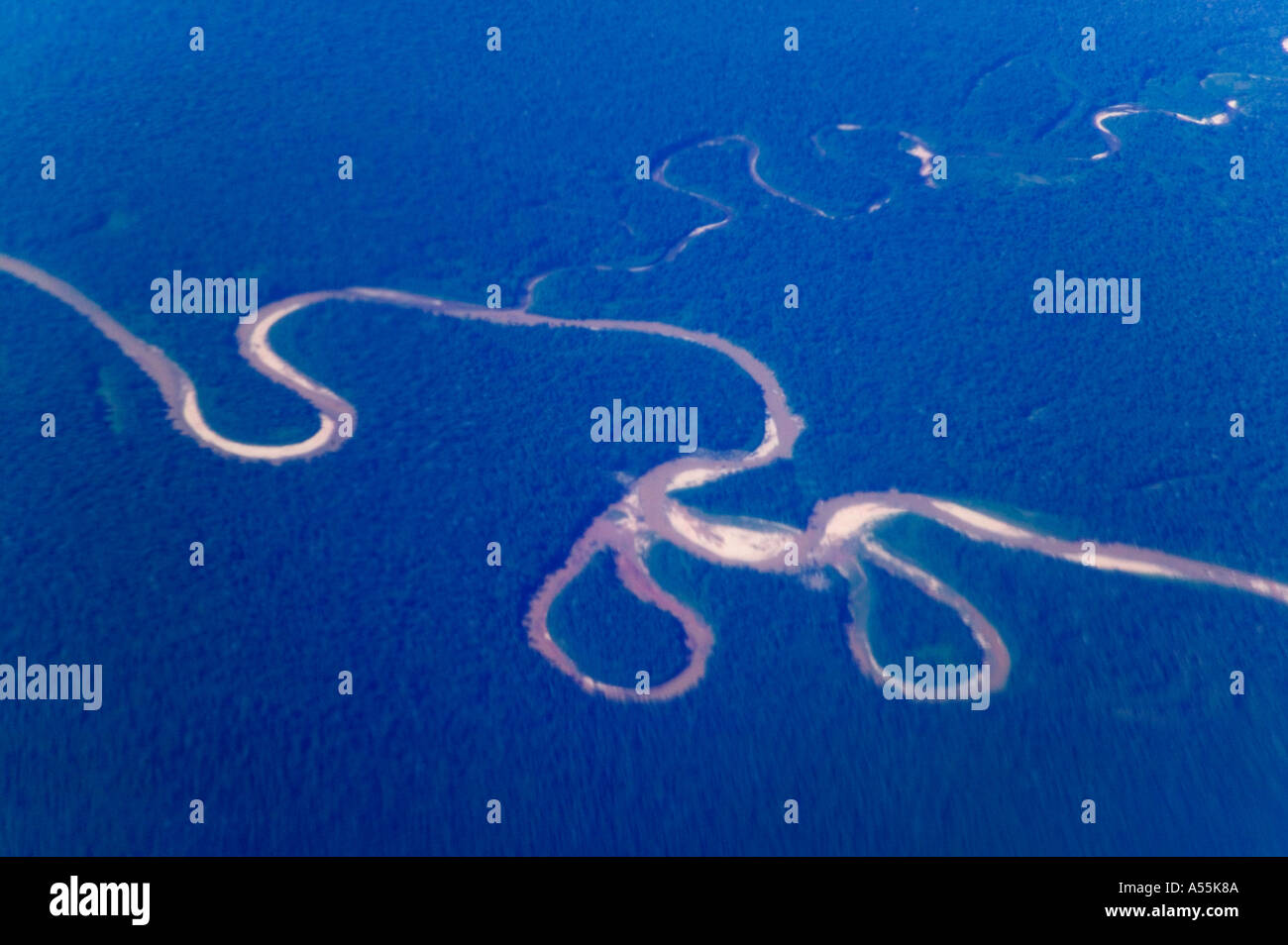 Aerial view of Amazon River winding through tropical jungle Peru Stock ...