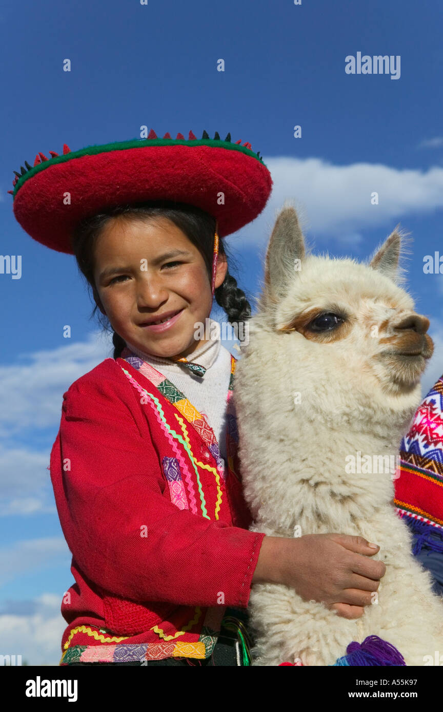 Indian girl with alpaca Cuzco Peru Stock Photo - Alamy