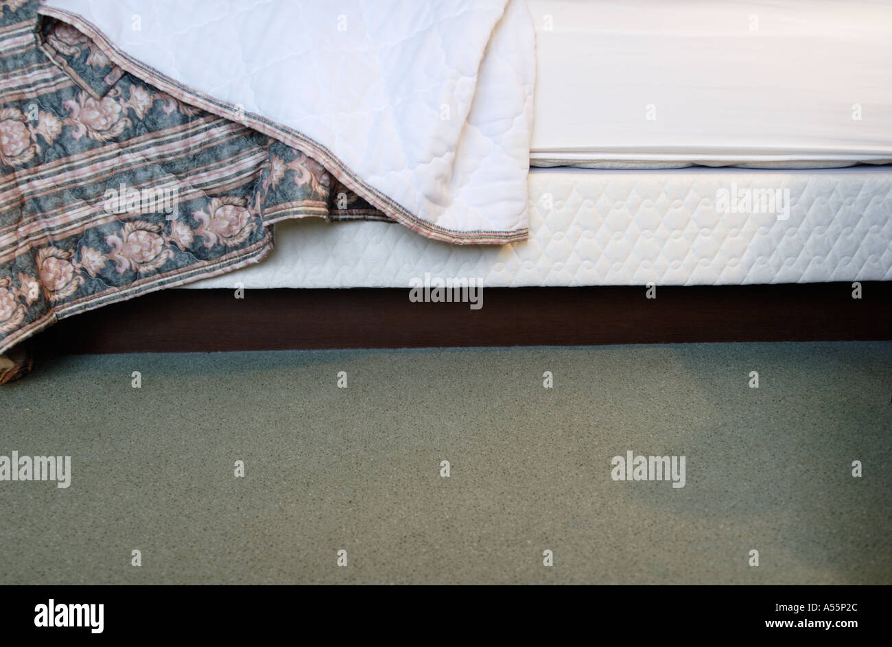 side of bed and covers Stock Photo - Alamy