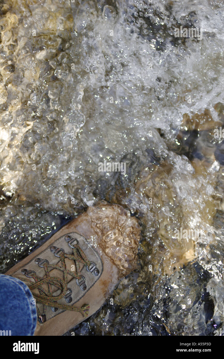 Image of boot from above on rocks in water Stock Photo - Alamy