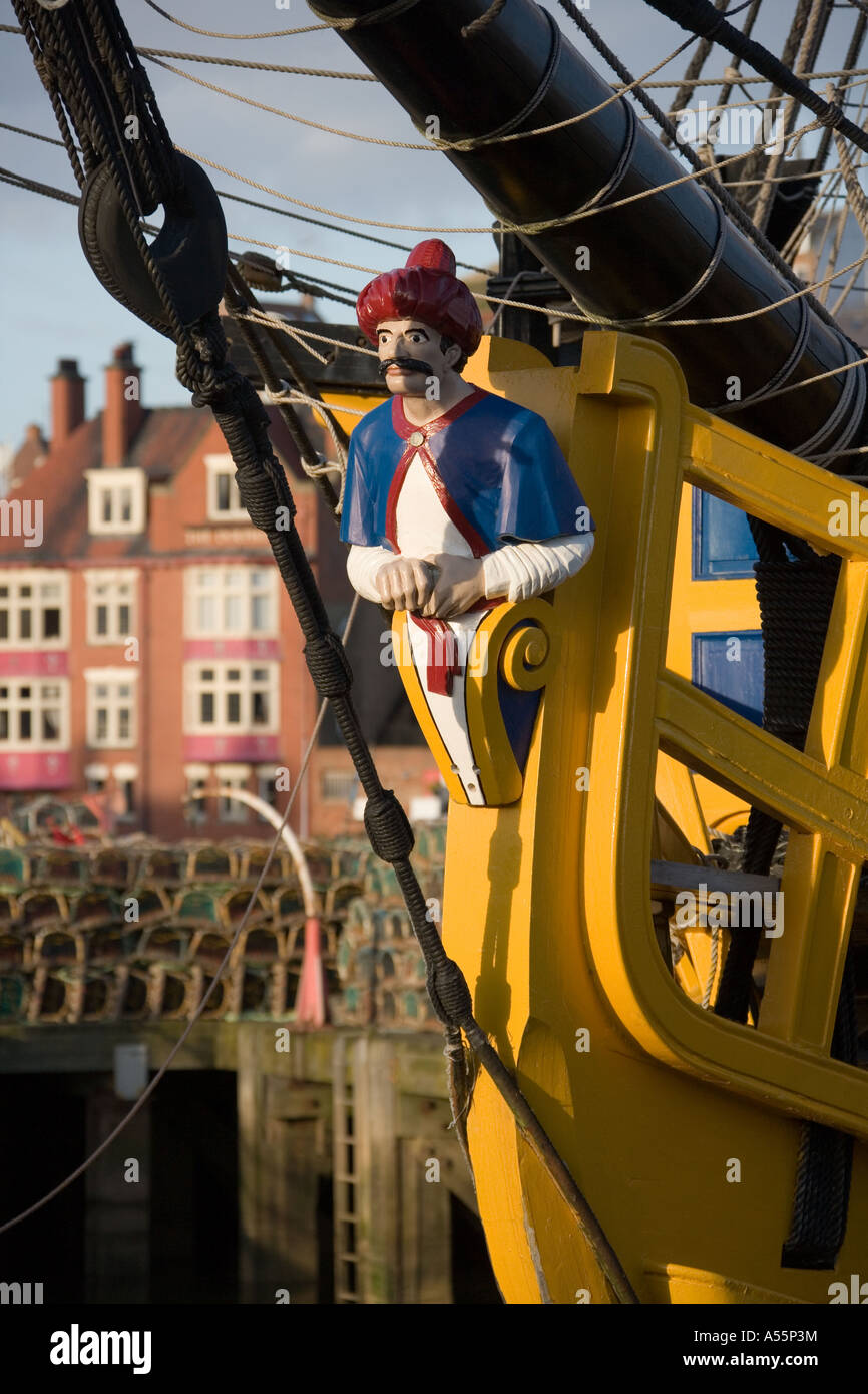 Wooden figurehead on the bow of an old ship in Whitby Harbour on the ...