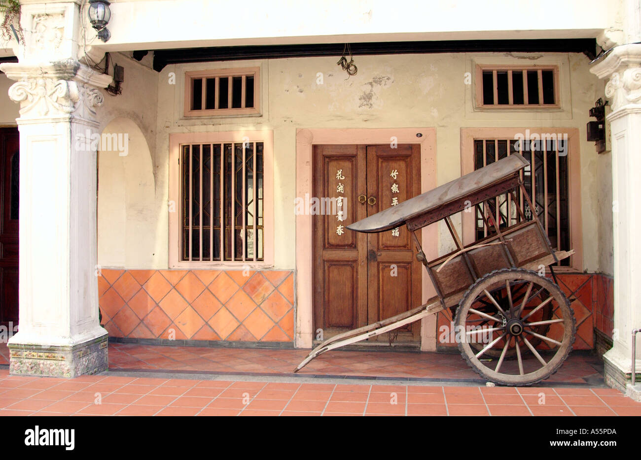 A wooden Chinese rickshaw in Chinatown Malacca Malaysia Stock Photo - Alamy