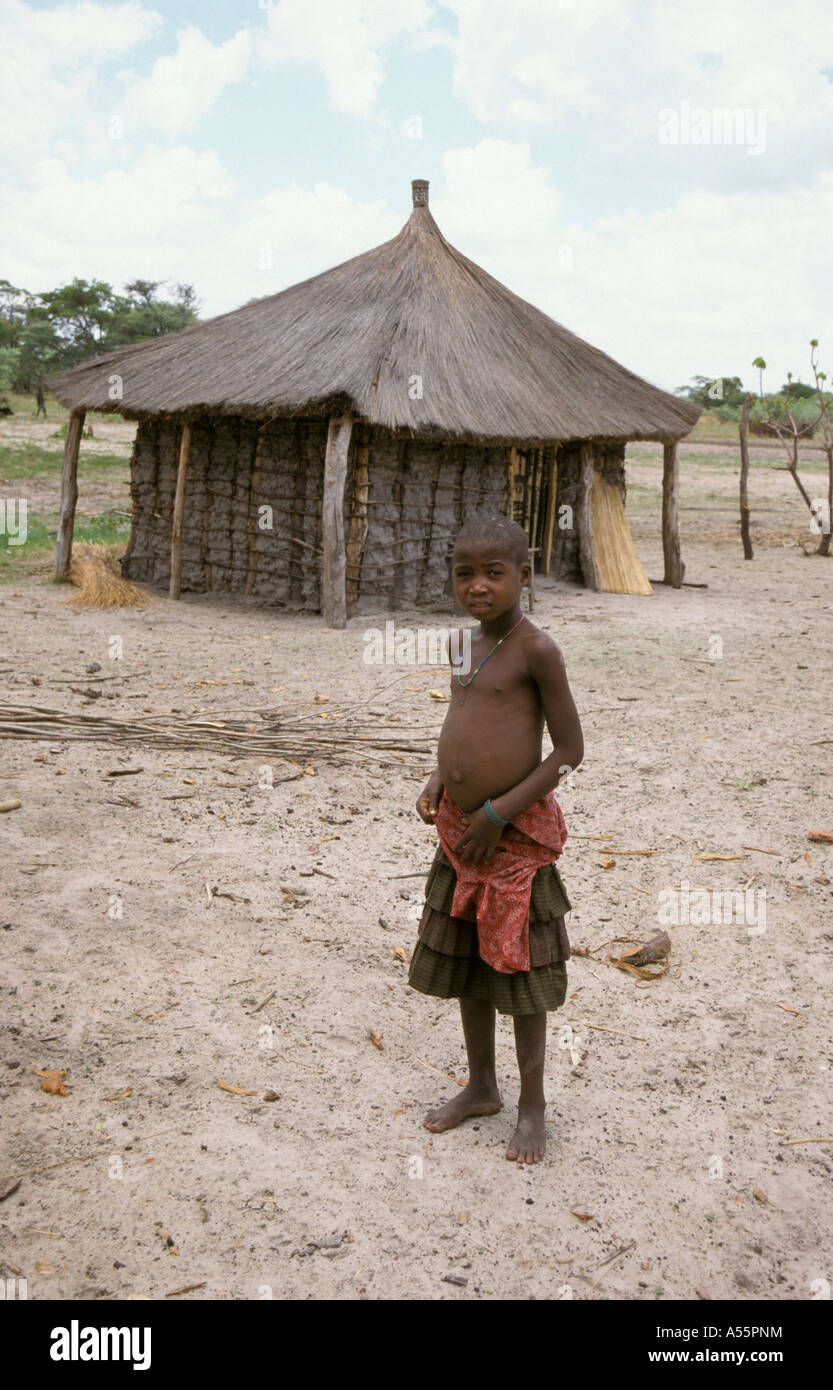 Painet is1673 zambia child standing front hut shangombo country ...