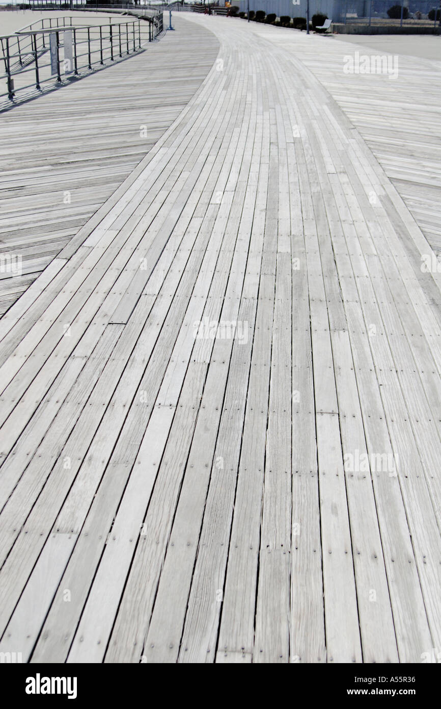 Wide view of old wooden boardwalk at public beach Stock Photo - Alamy