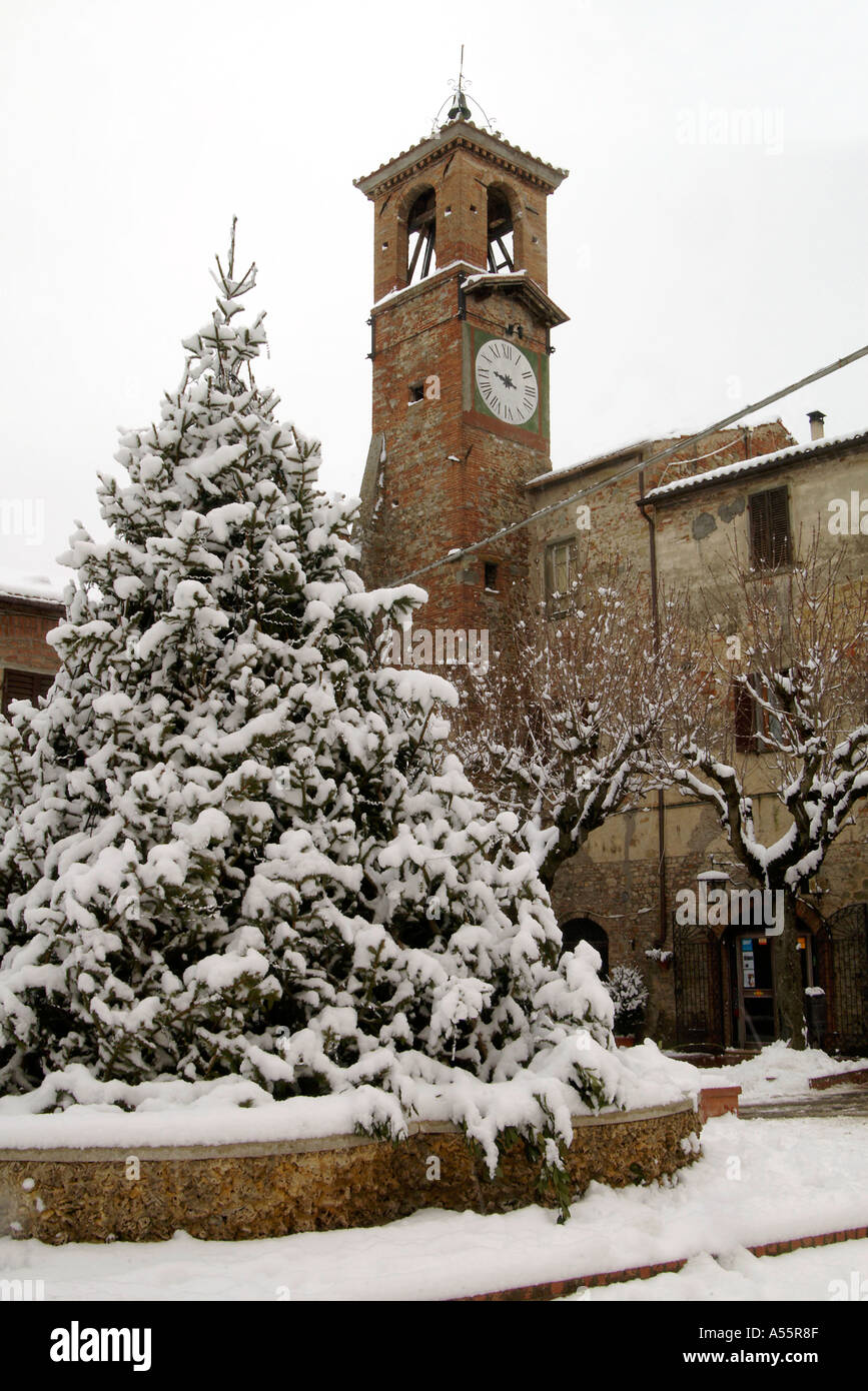 The central piazza in Citerna after snowfall The camponile clock tower ...