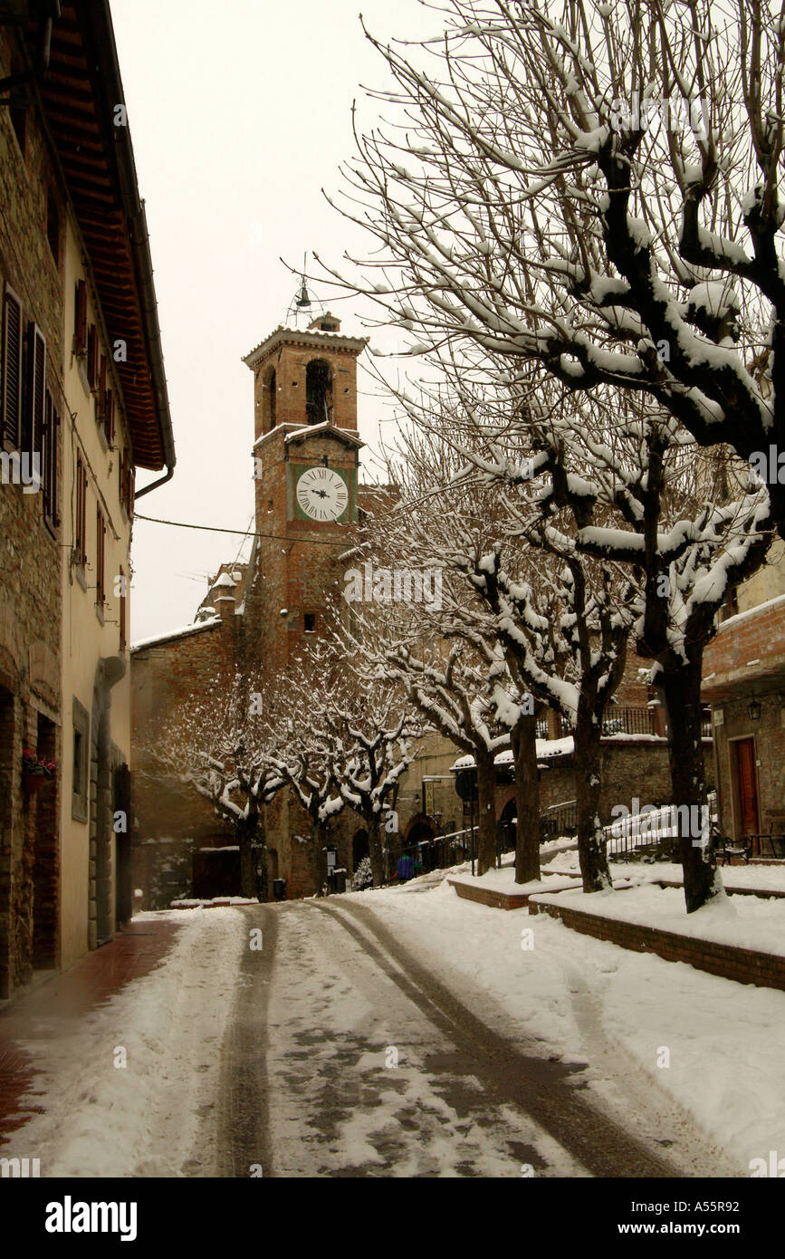 The main street in Citerna after snowfall The camponile clock tower ...