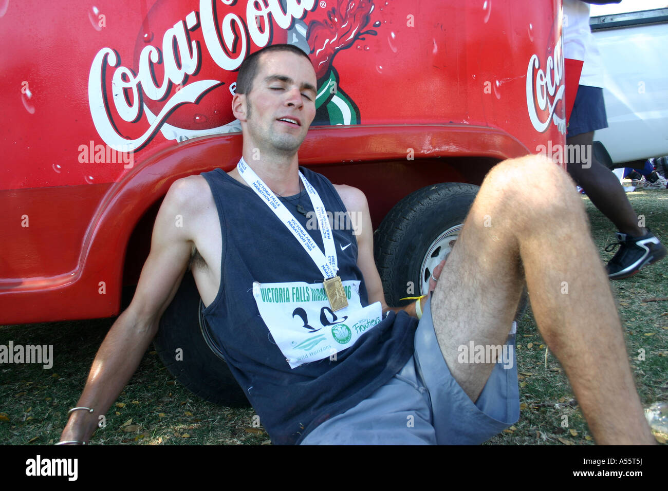 Exhausted marathon runner Stock Photo - Alamy