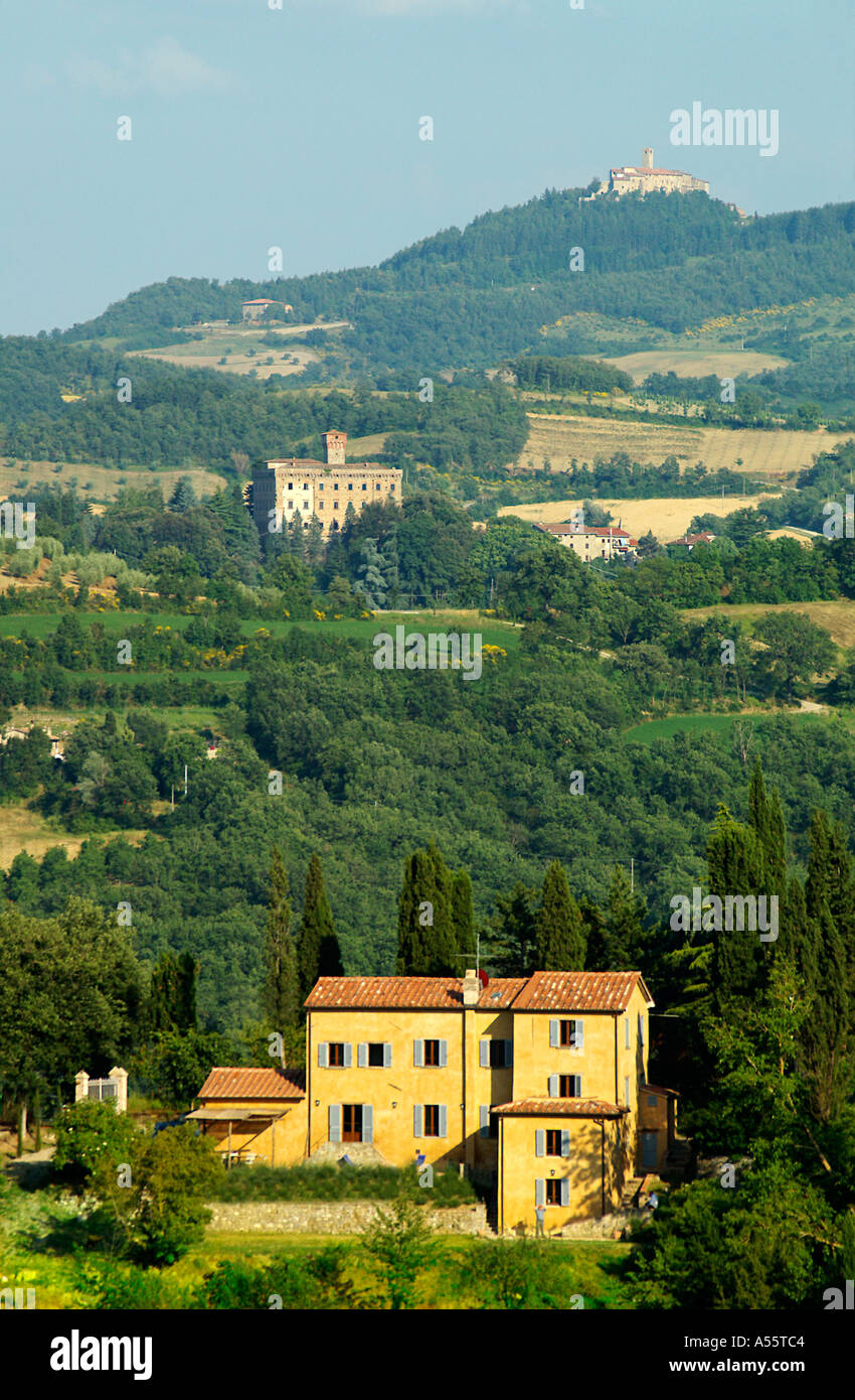 Villa Ura set in the Tuscan hillsides against the castle of Lippiano ...