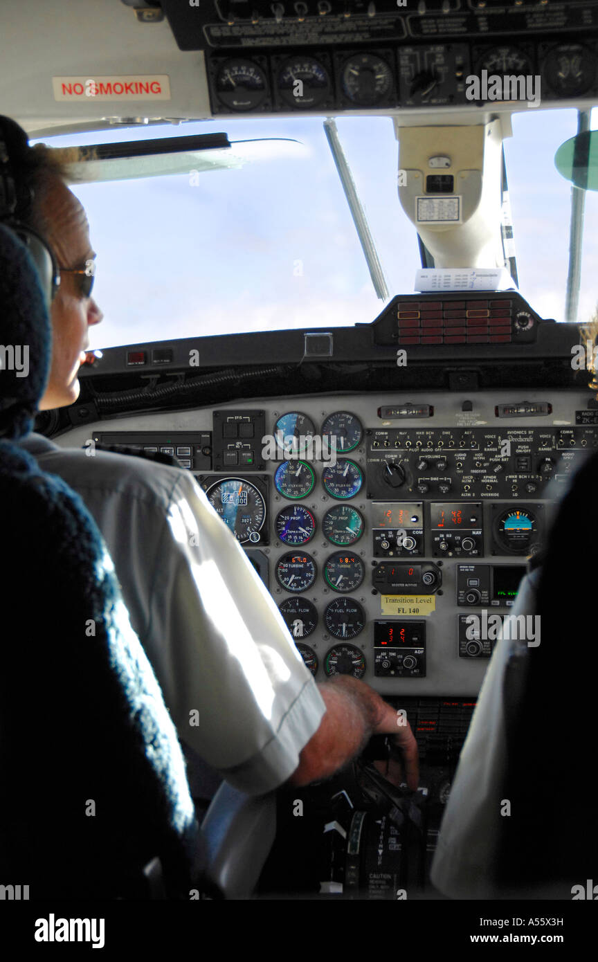 Pilot at controls of an Air new Zealand Beech1900D passenger commuter ...