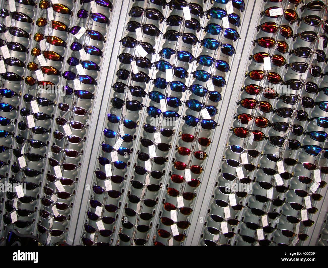 sunglasses on a display stand Stock Photo - Alamy