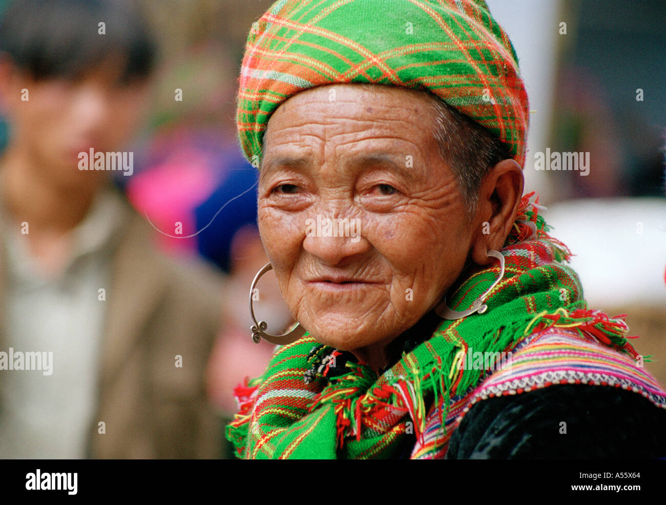 Portrait of an old woman of the Hmong Tribe in traditional dress at the ...