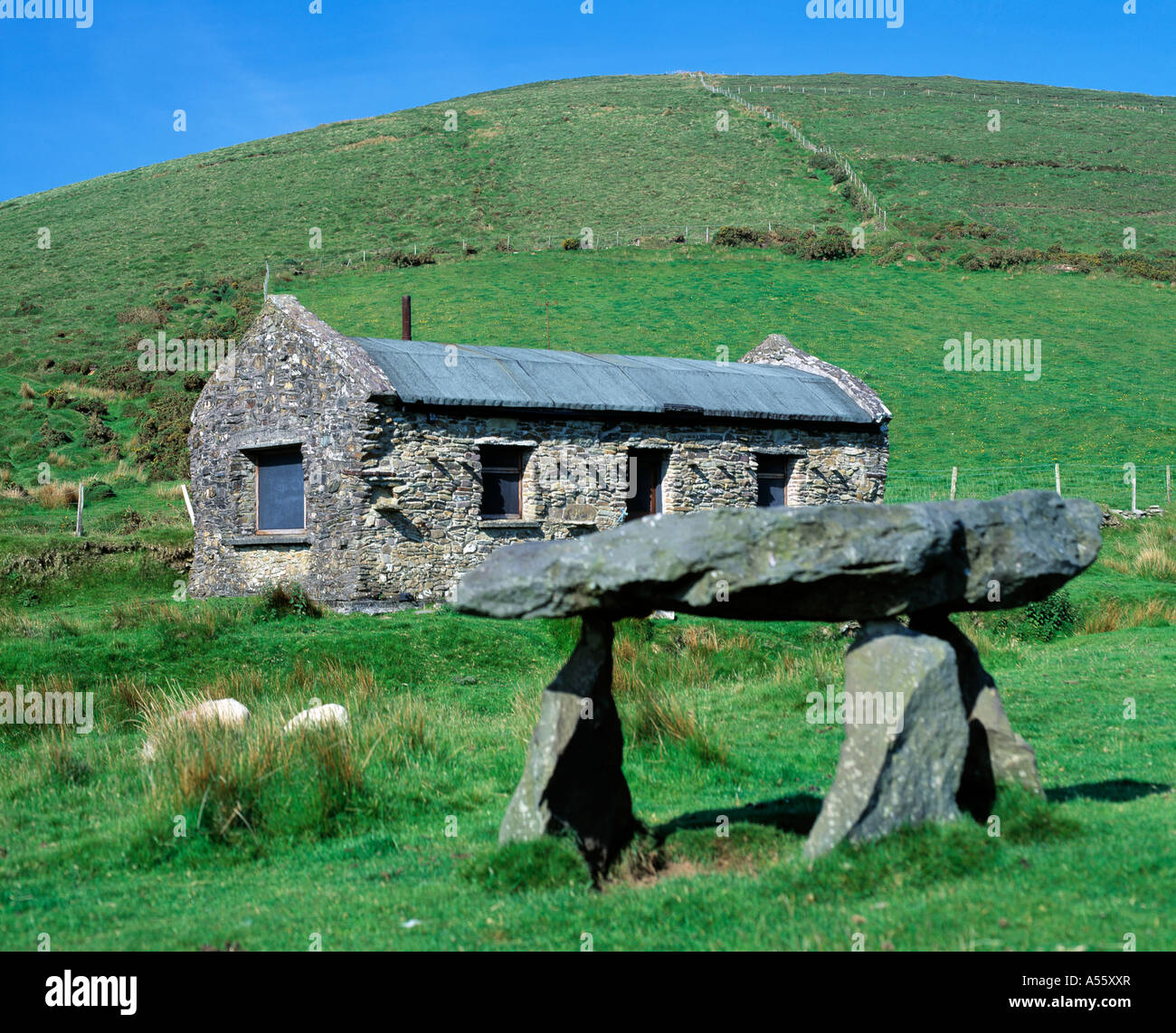 simple stone cottage on an irish countryside/hill side Stock Photo - Alamy