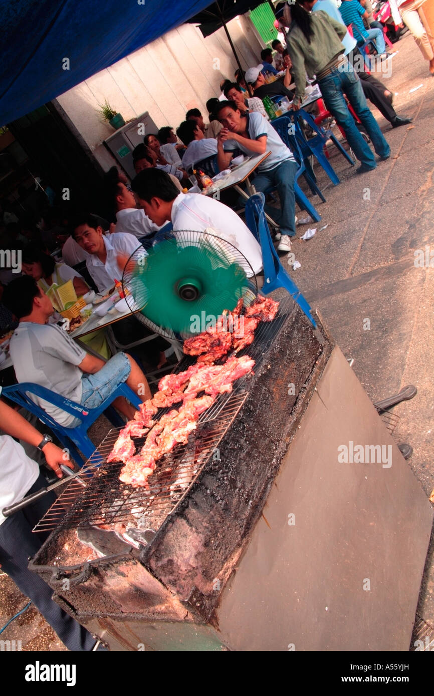 Street Vendor in Saigon selling cooked meats Stock Photo - Alamy